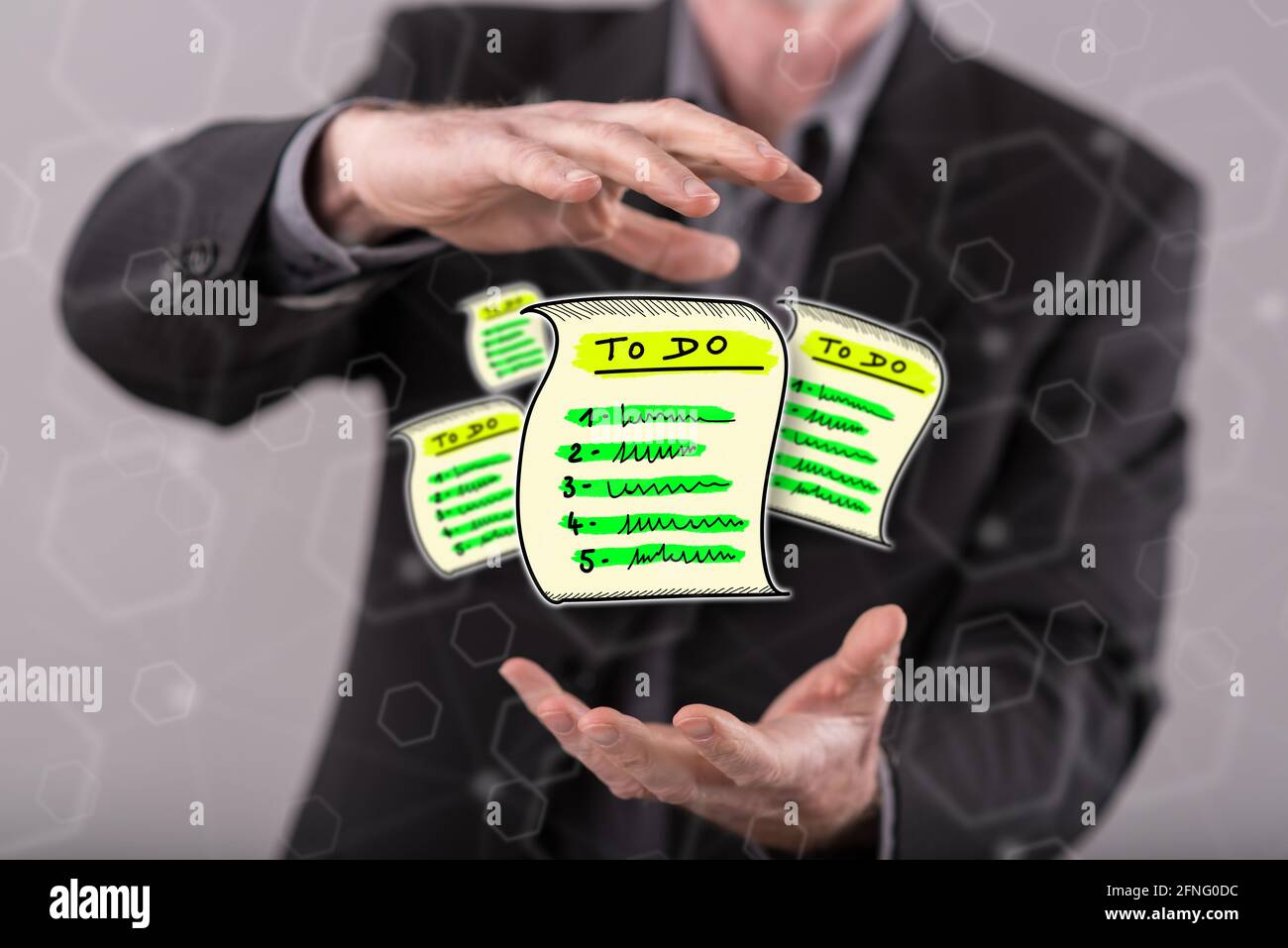 To do list concept between hands of a man in background Stock Photo - Alamy