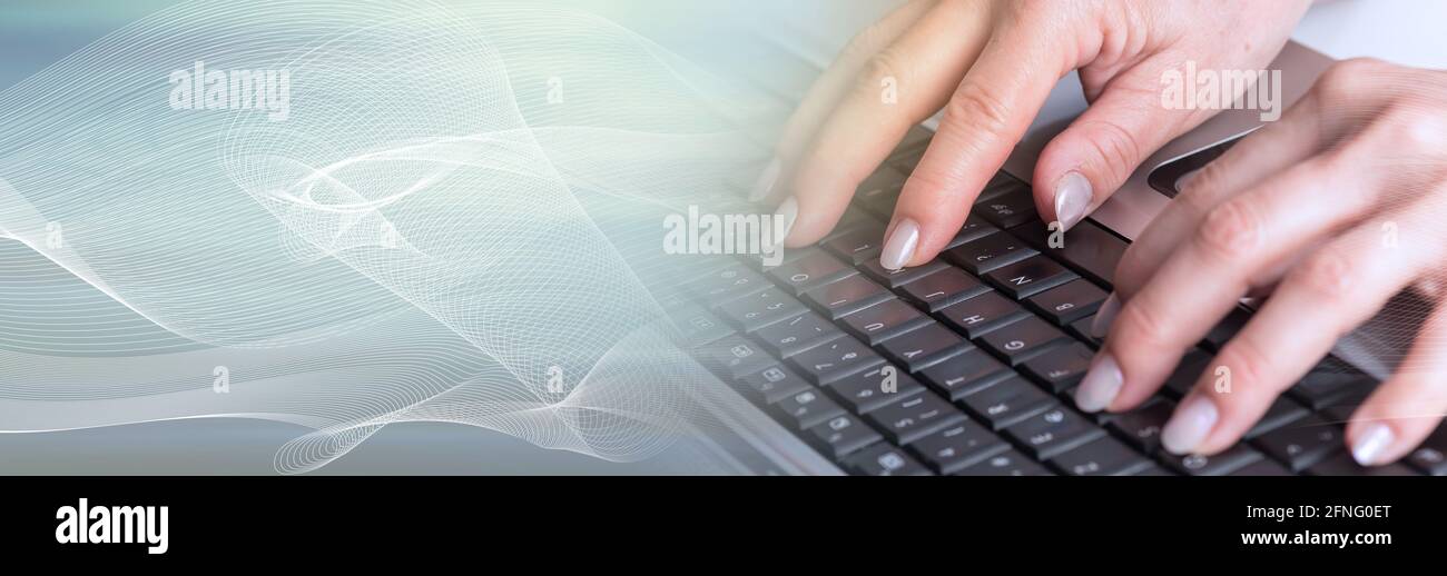 Female hands typing on a laptop keyboard, light effect. panoramic ...