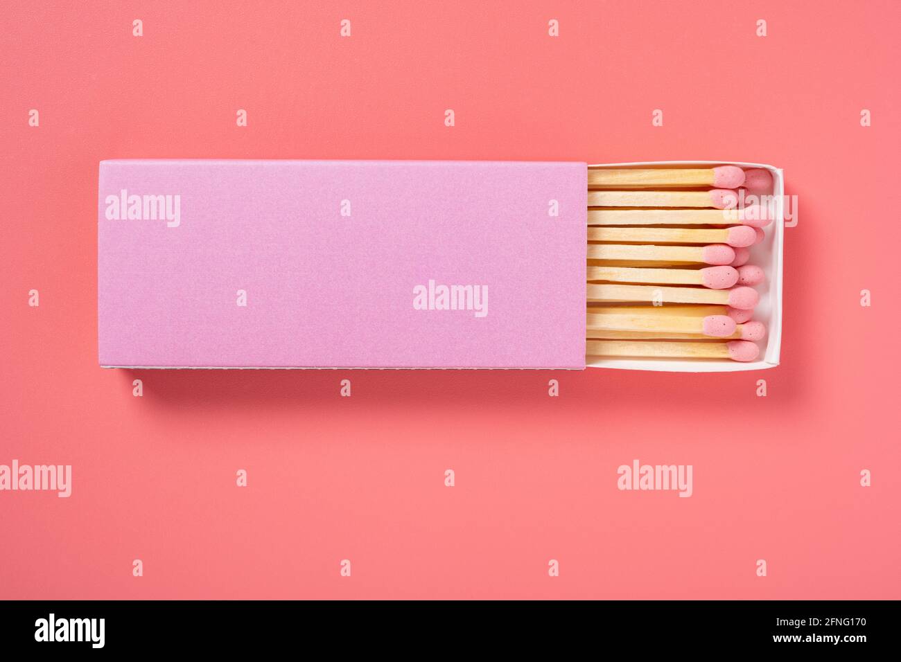 pink color matchbox and pink match sticks on a pink background Stock ...