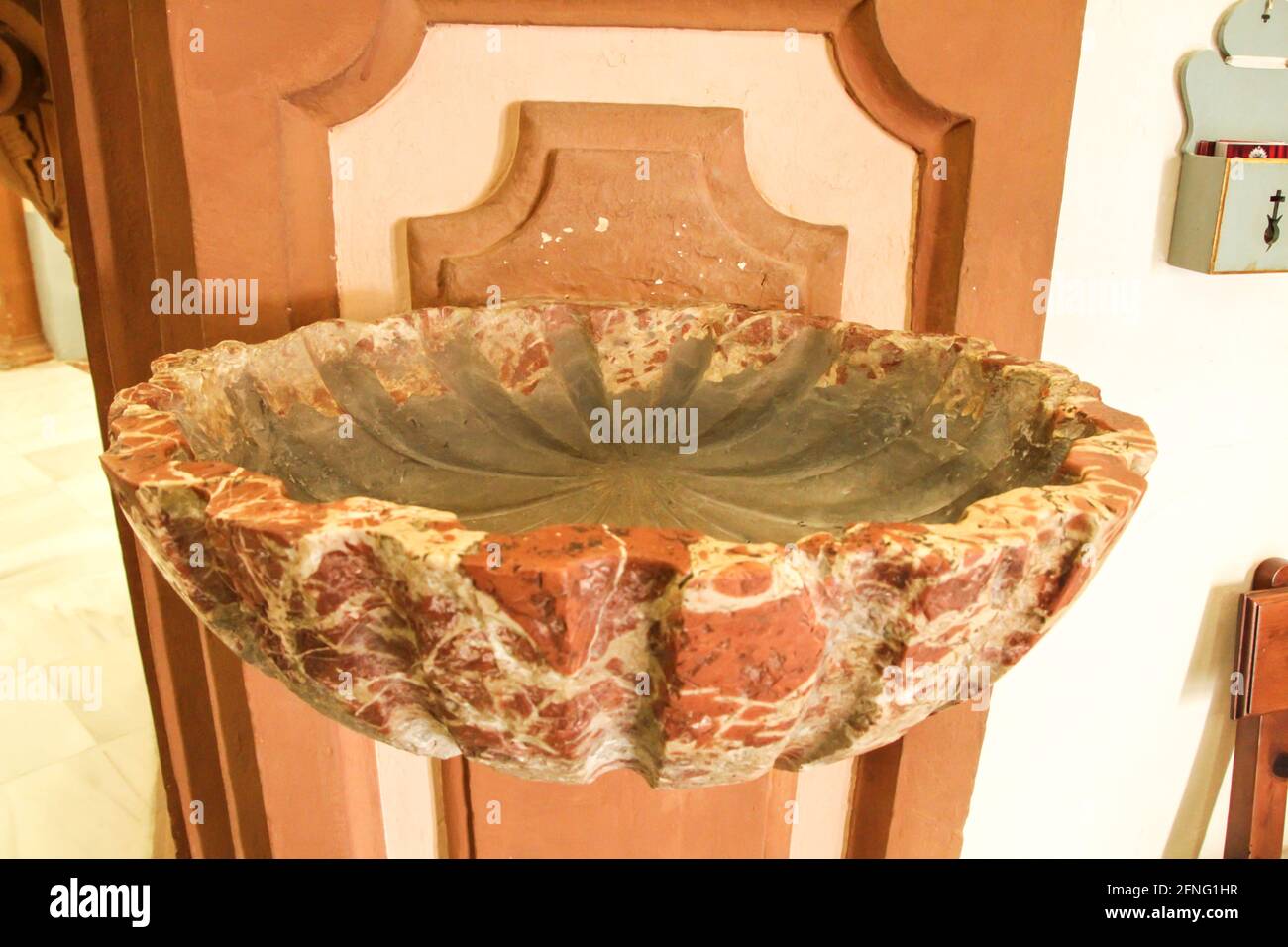 Marble pile with holy water in a church in Spain Stock Photo - Alamy