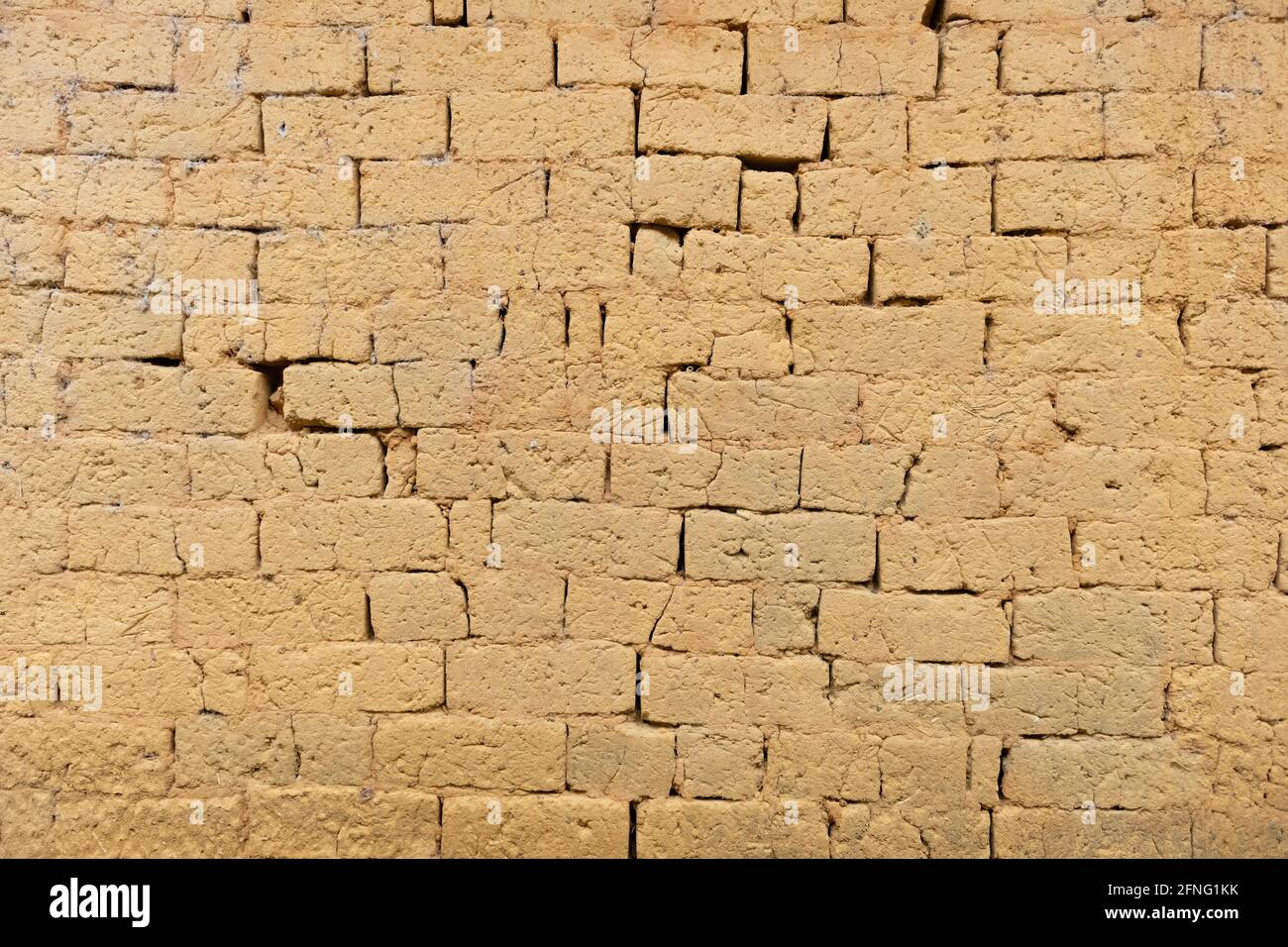 wall made of mud as background and texture Stock Photo - Alamy