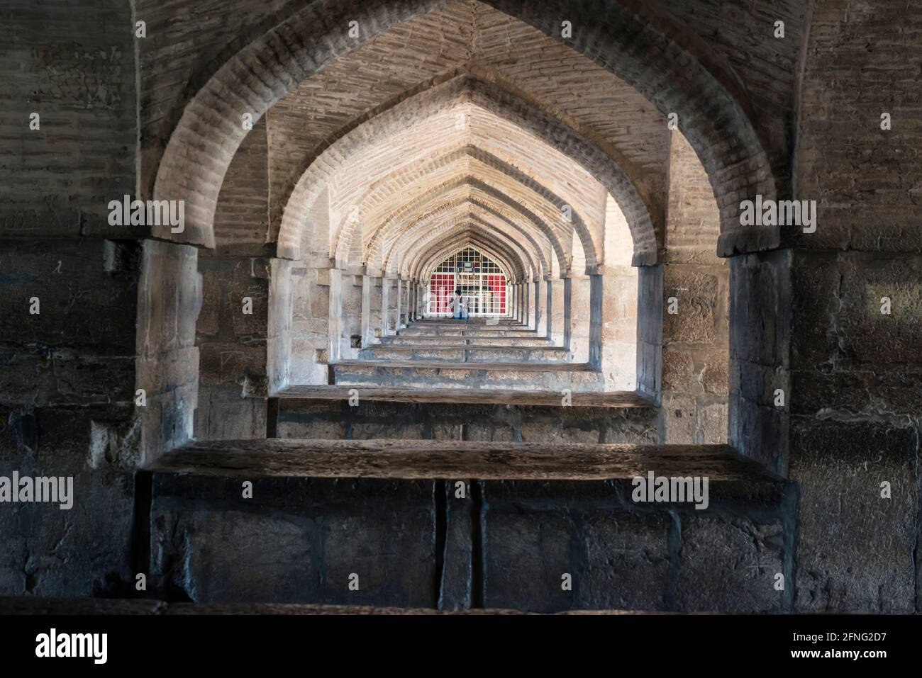 Arches under the historic Khaju bridge over the Zayanderud river in ...