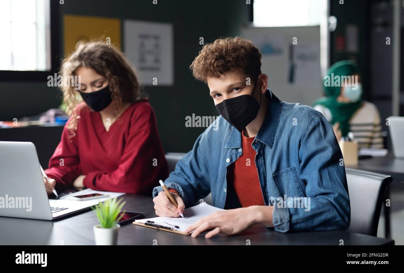 Group of people attending education class in community center ...