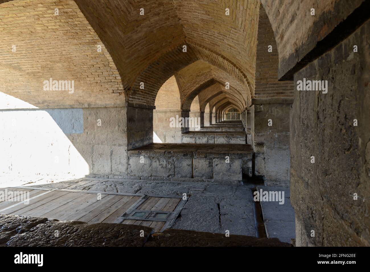 Arches under the historic Khaju bridge over the Zayanderud river in ...