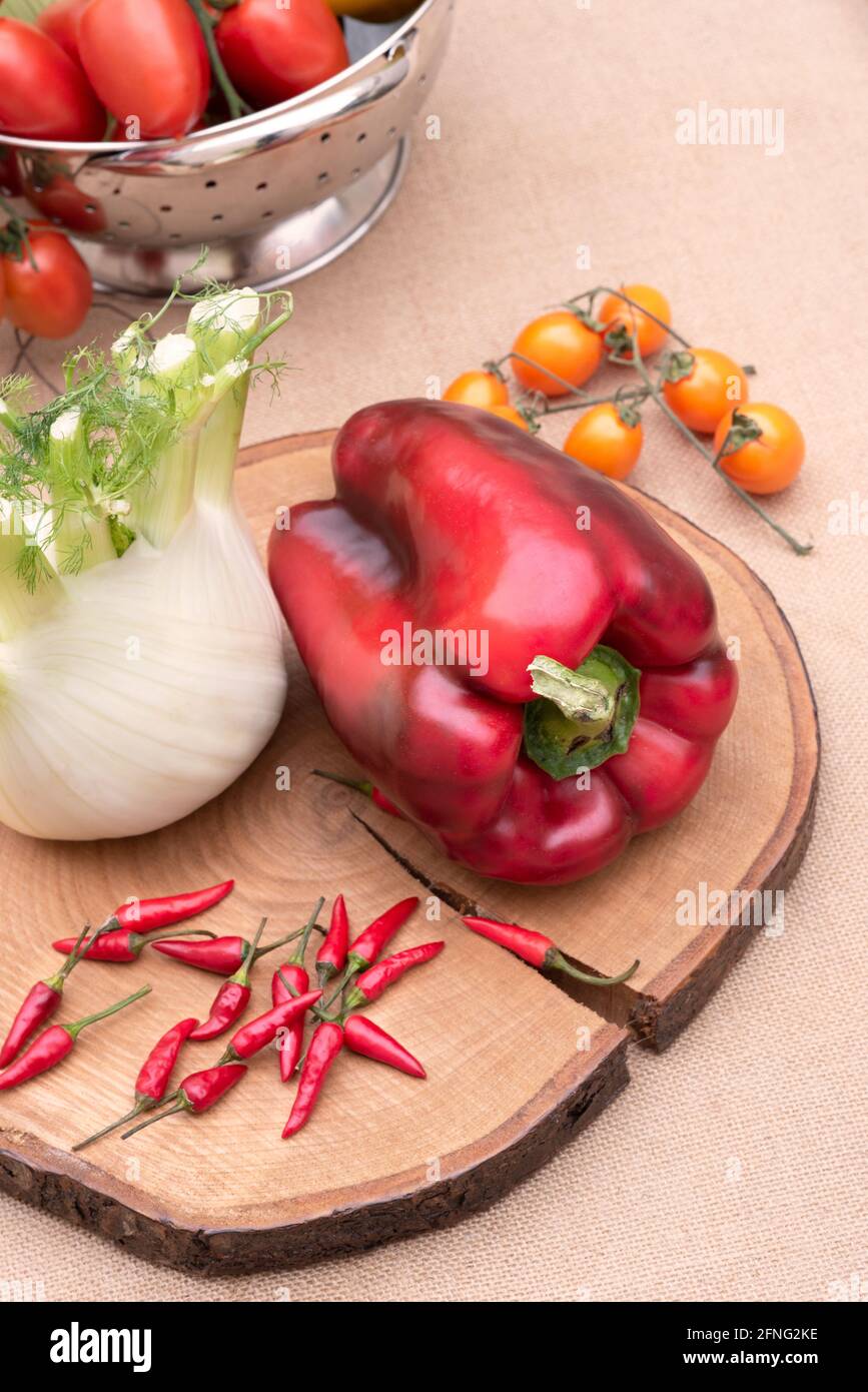 Fresh and various vegetables, peppers fennel celery and tomatoes on a ...