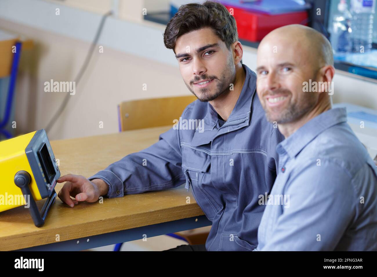future civil engineer posing with teacher Stock Photo - Alamy