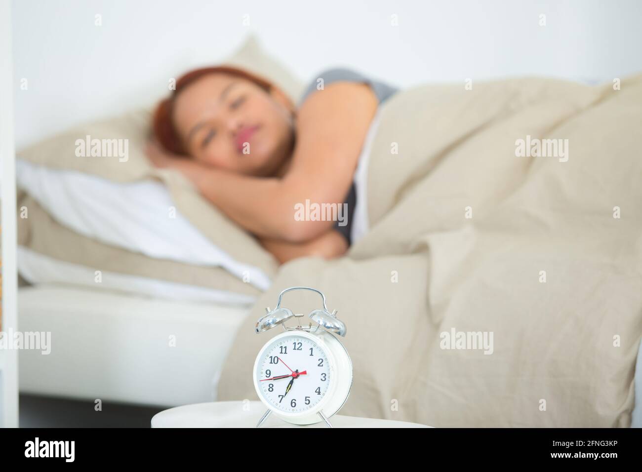 Fast asleep woman bed hi-res stock photography and images - Alamy