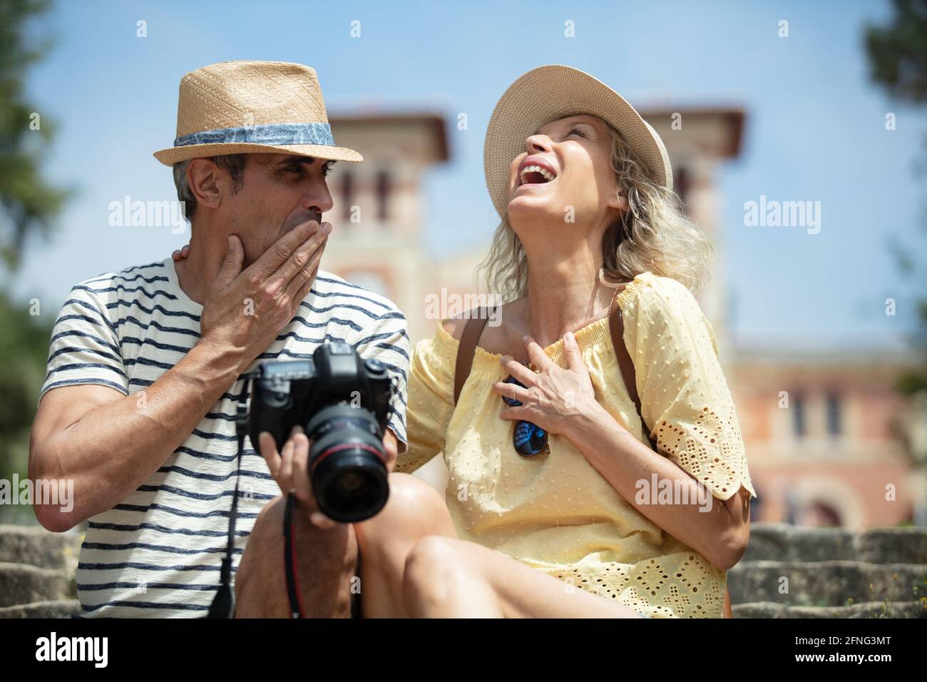 traveling senior couple taking pictures together Stock Photo - Alamy