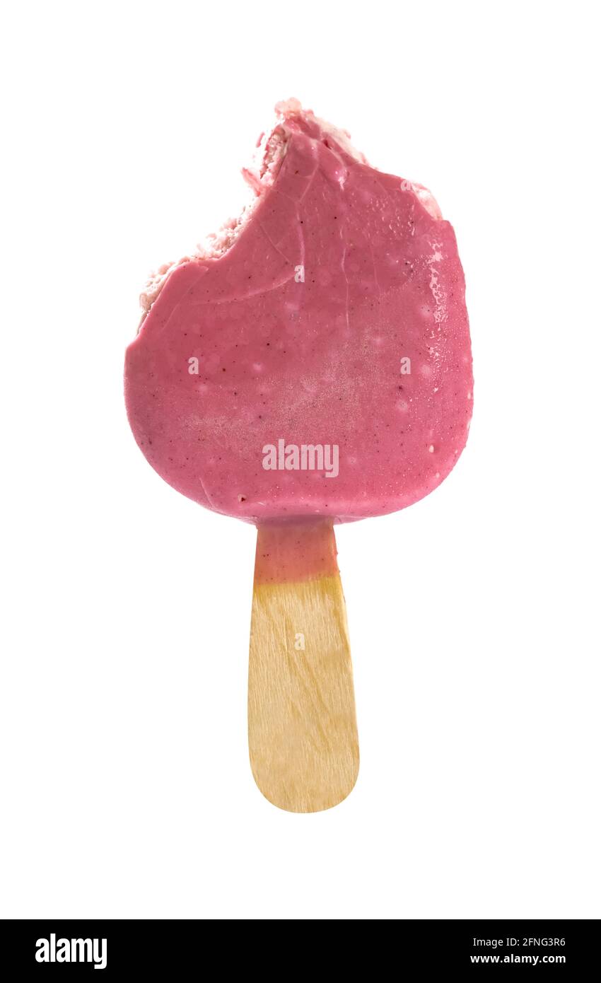 mostly eaten red color chocolate outer popsicle on a white background ...