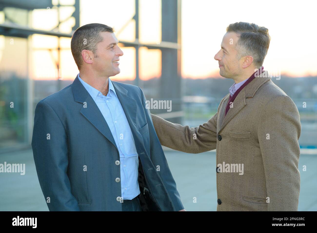 portrait of two men outdoors Stock Photo - Alamy