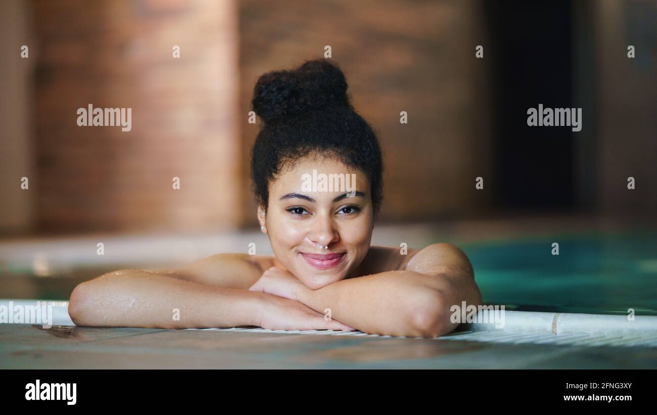 Woman edge pool water looking hi-res stock photography and images - Alamy