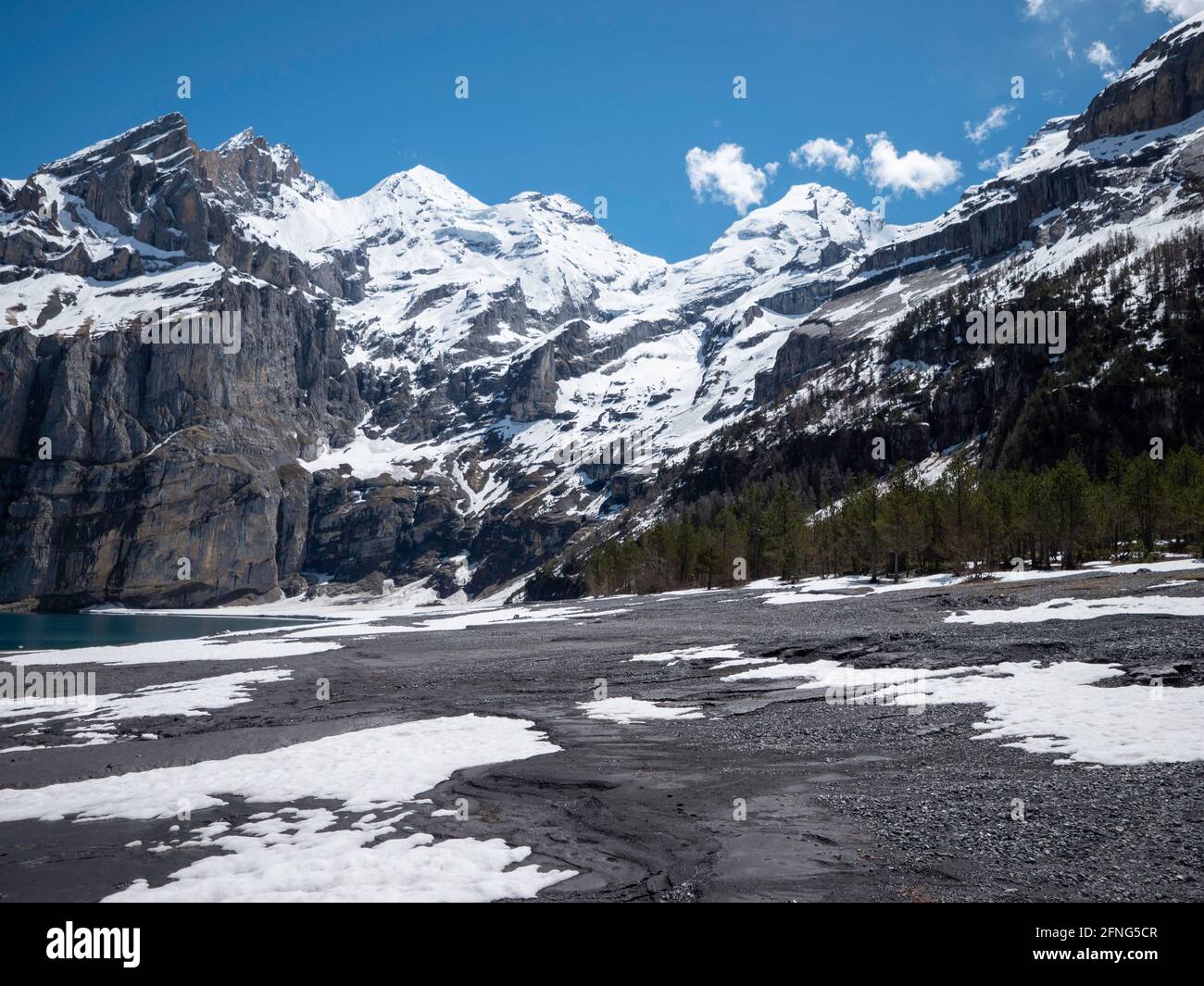 High alpine lake of Oeschinensee in Kandersteg, Switzerland. The ...