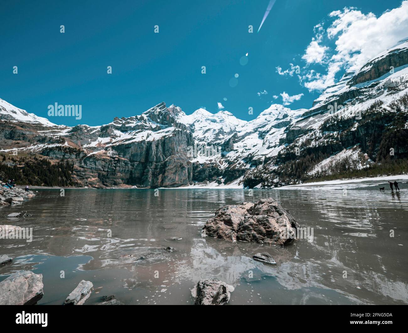 High alpine lake of Oeschinensee in Kandersteg, Switzerland. The ...