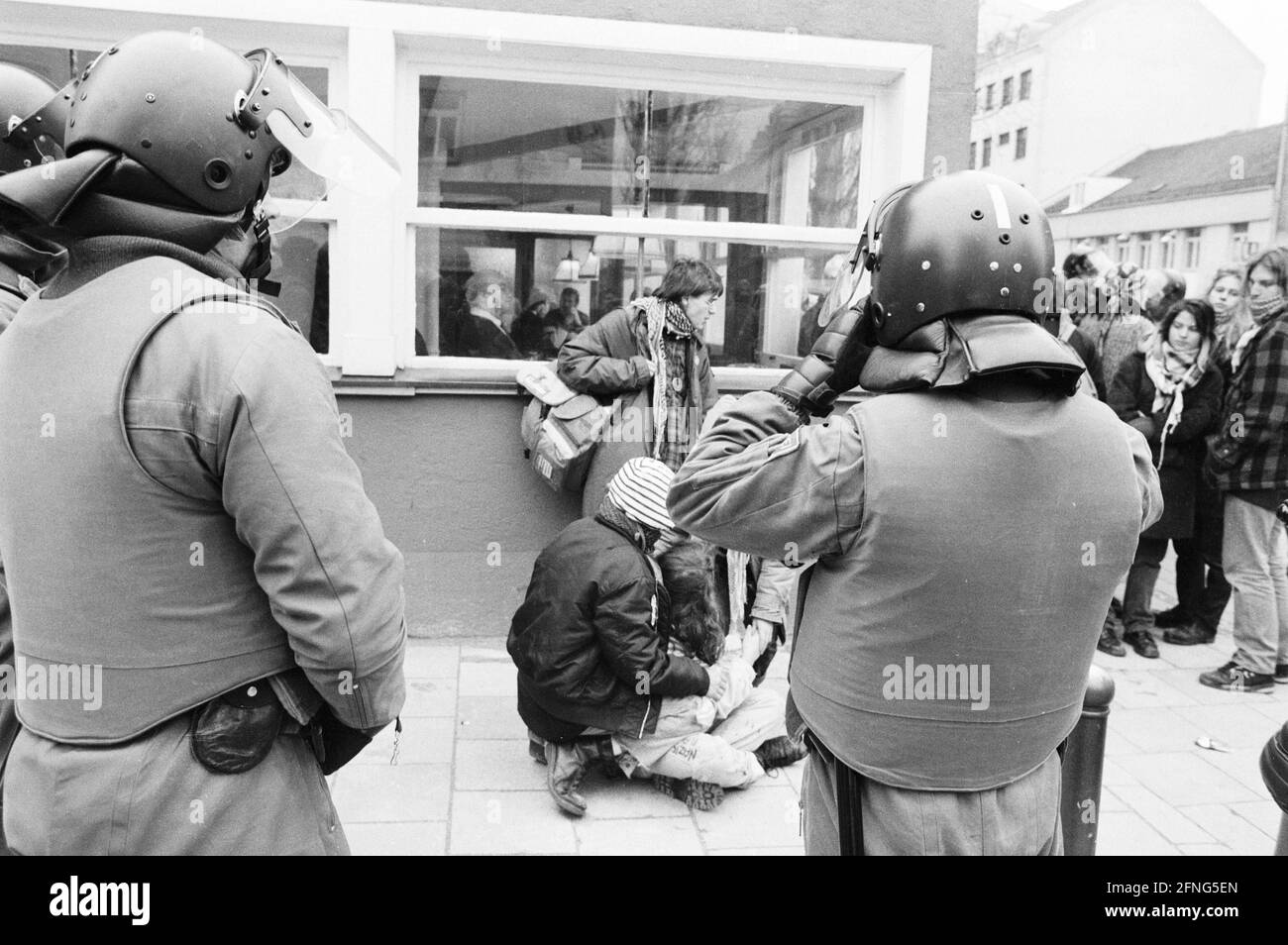 Police observe demonstrators in Munich. The protest takes place on the ...