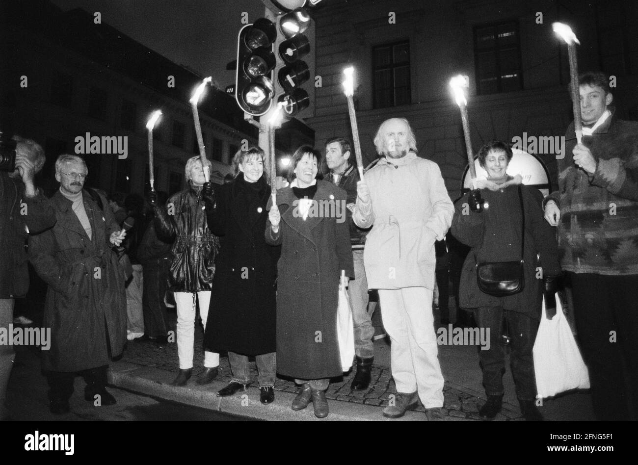 Demonstrators with a chain of lights at Odeonsplatz. They protest ...
