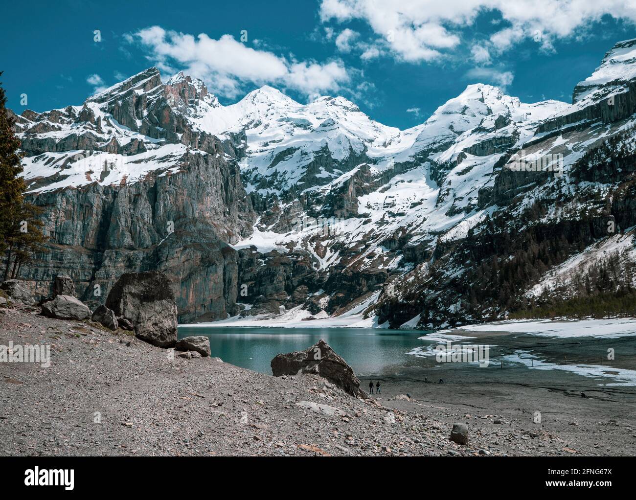 High alpine lake of Oeschinensee in Kandersteg, Switzerland. The ...