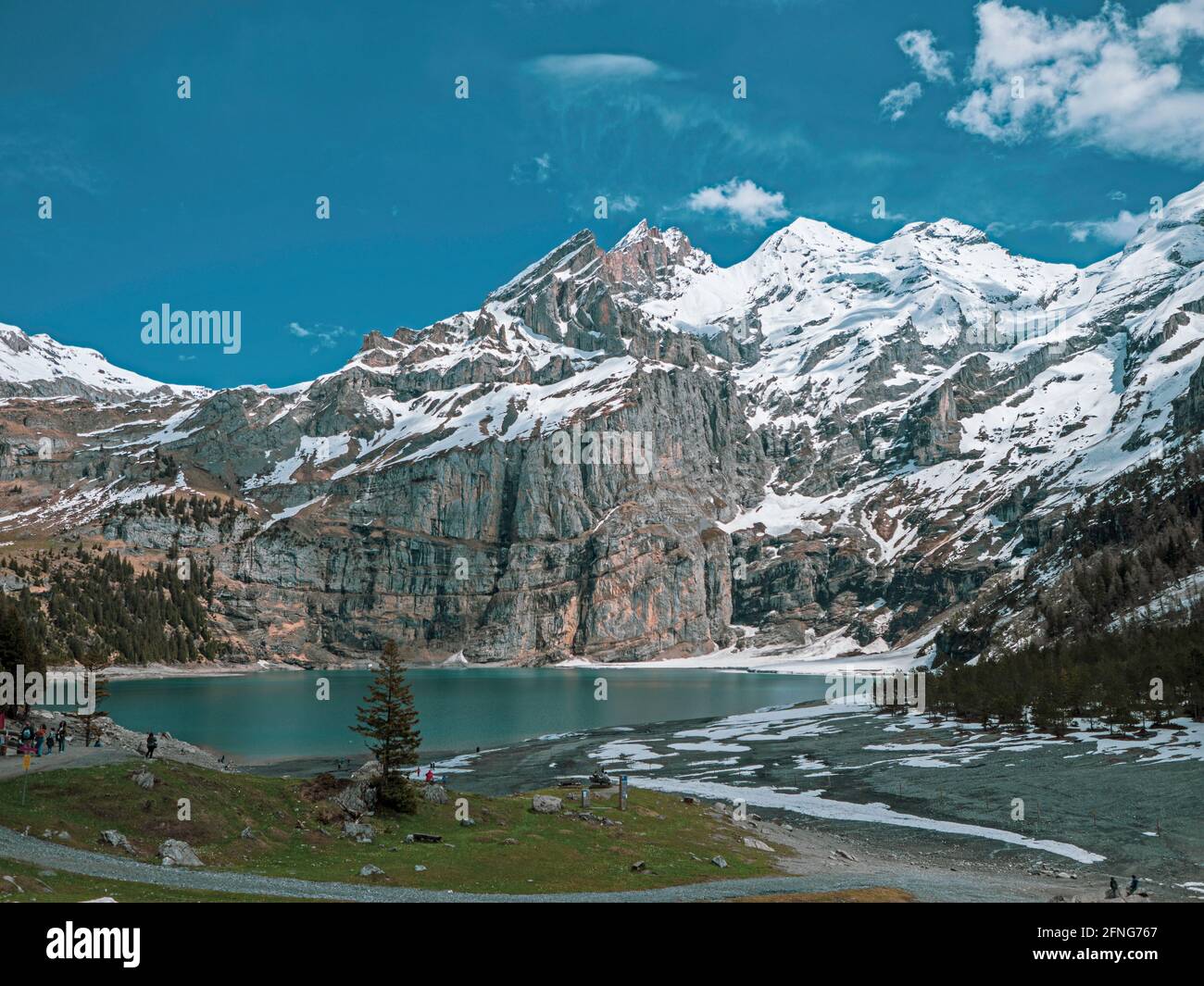 High alpine lake of Oeschinensee in Kandersteg, Switzerland. The ...