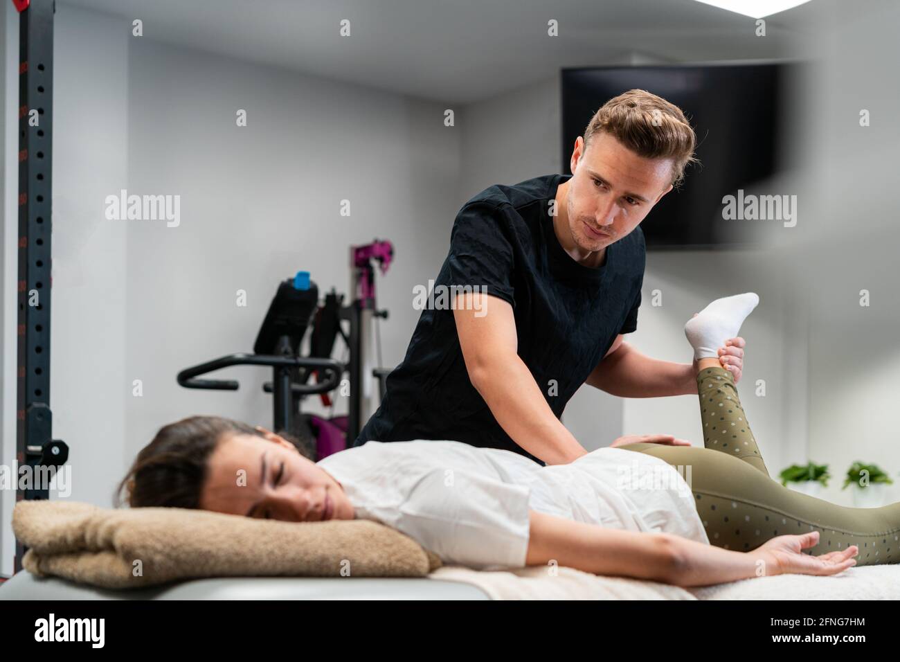 Man touching woman leg hi-res stock photography and images - Alamy