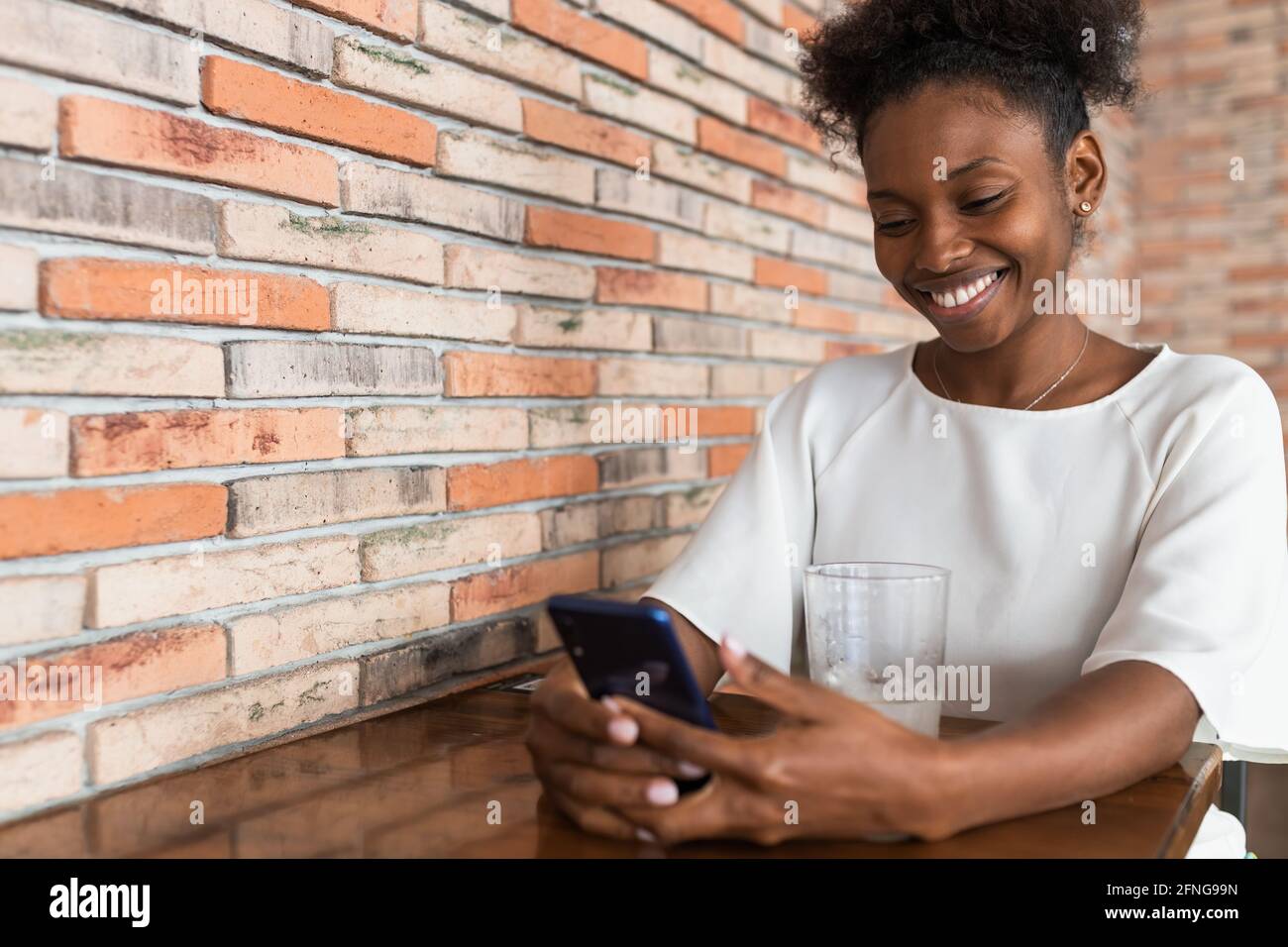 Full body back view of anonymous fit female in sportswear roller ...