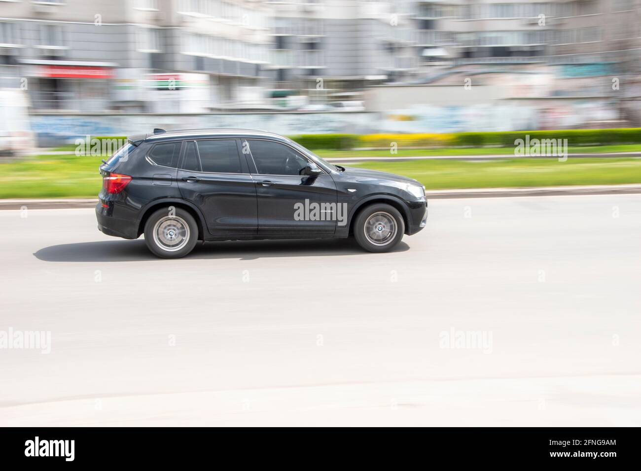 Ukraine, Kyiv - 26 April 2021: Gray BMW X3 car moving on the street ...
