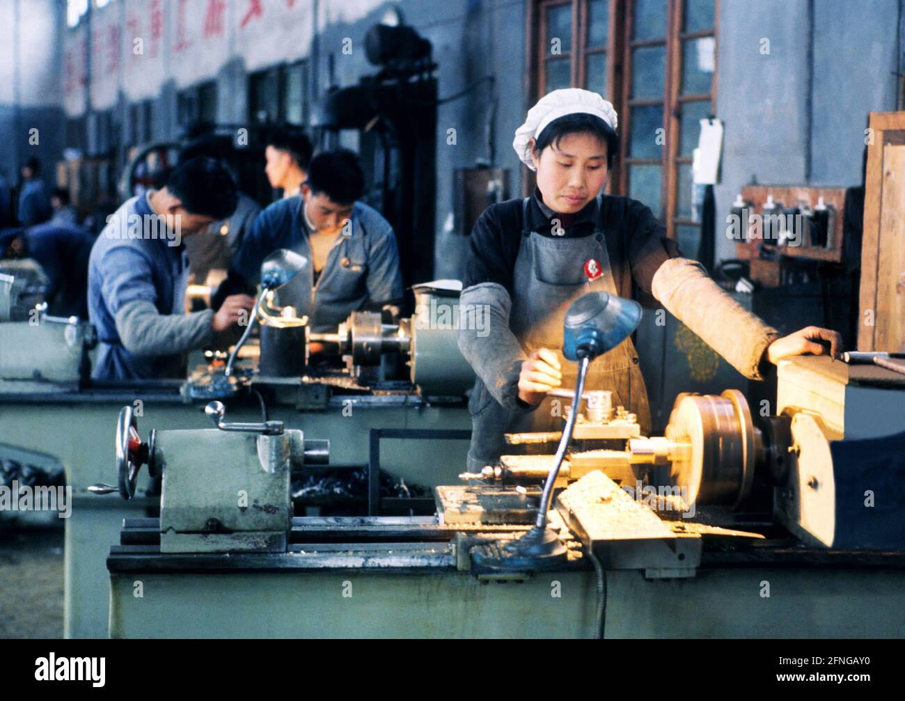 China, Shanghai, February 1971 Photo: View into a factory [automated ...