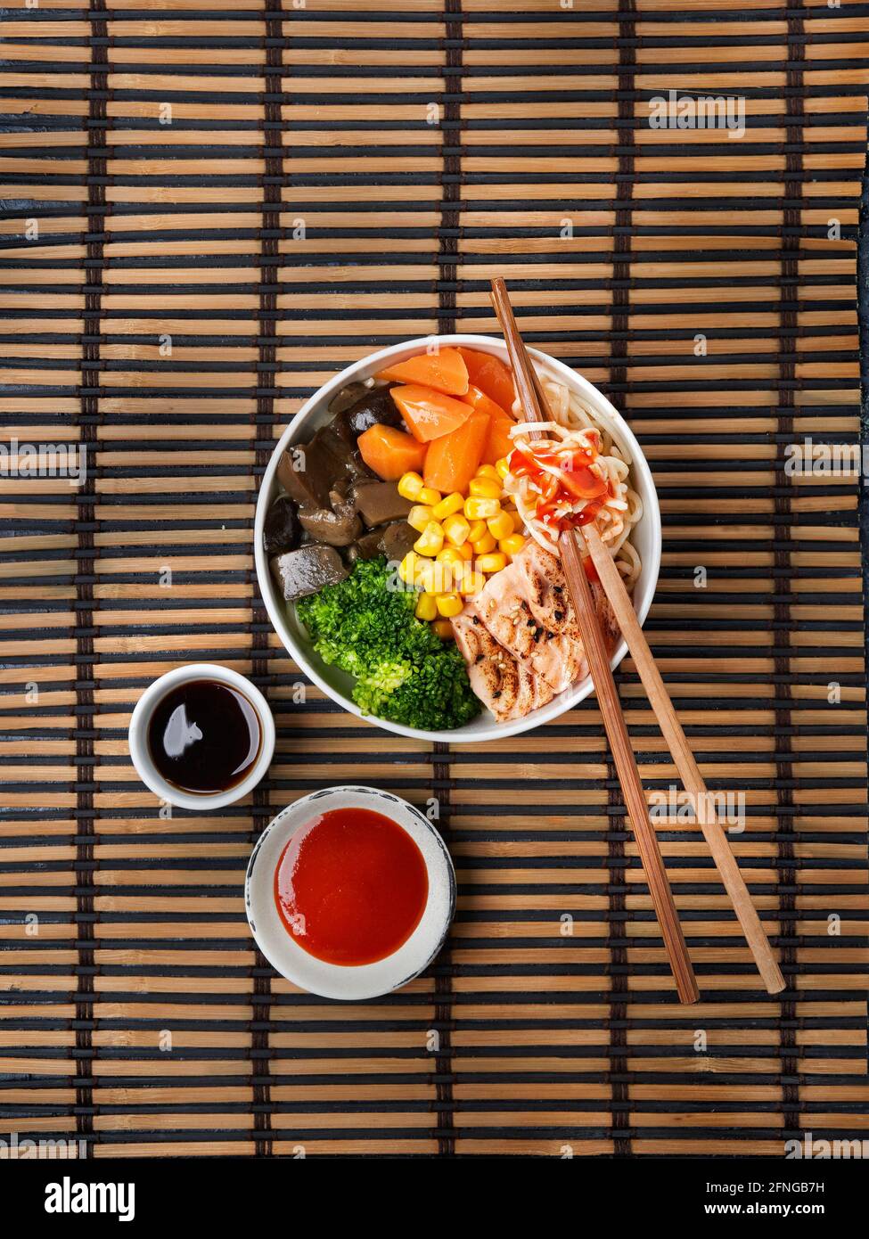 Delicious poke bowl with many ingredients seen from above Stock Photo ...