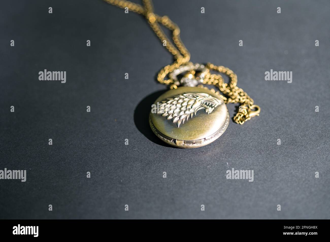 Pocket watch with a wolf head design closeup. Selective Focus Stock ...