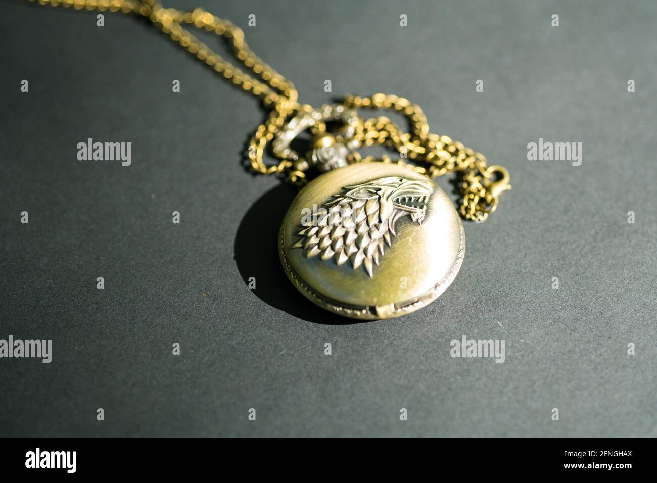 Pocket watch with a wolf head design closeup. Selective Focus Stock ...