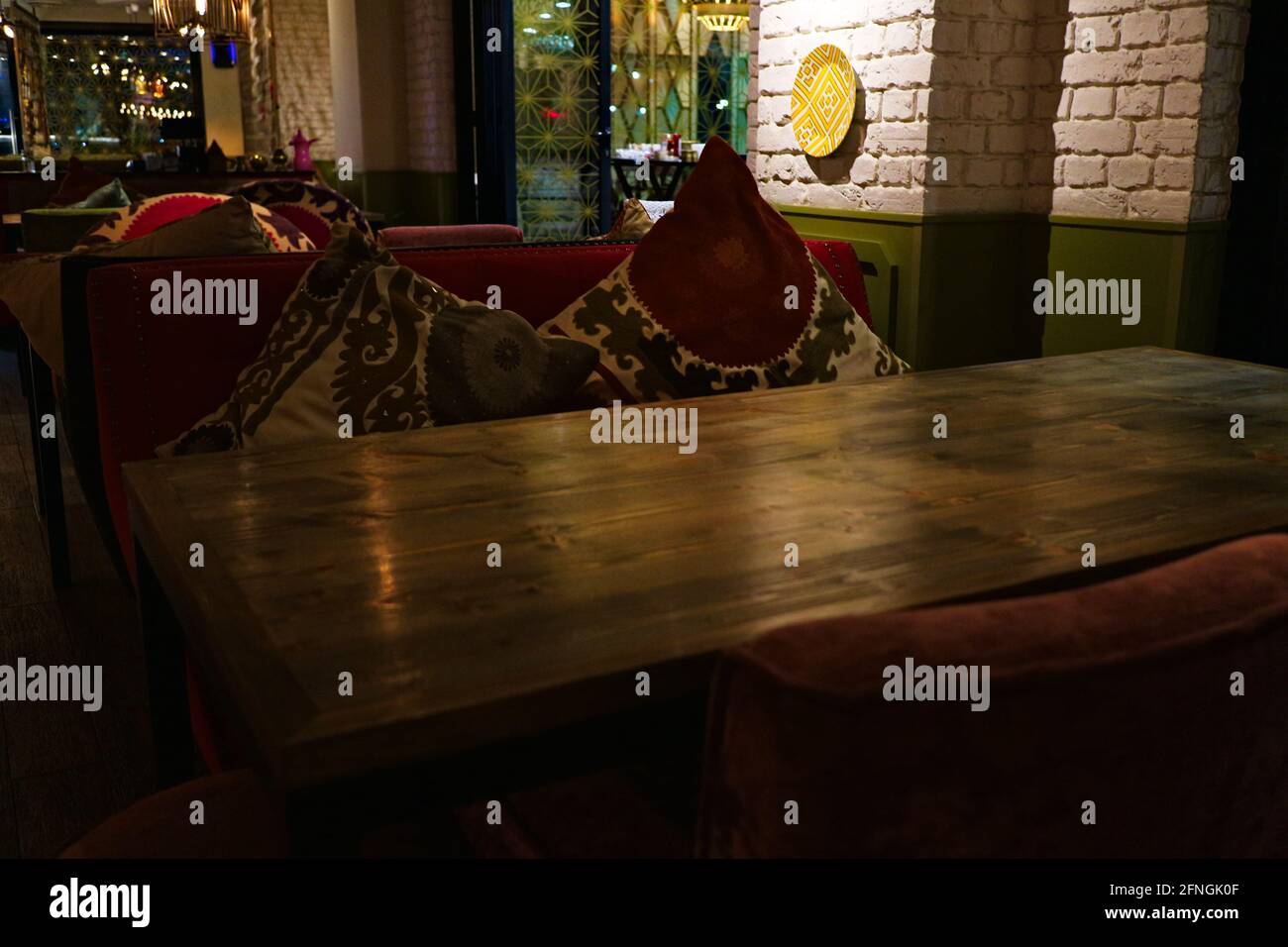 Kuwait City, Kuwait - May 5, 2021: Interior with wood table and ethnic ...