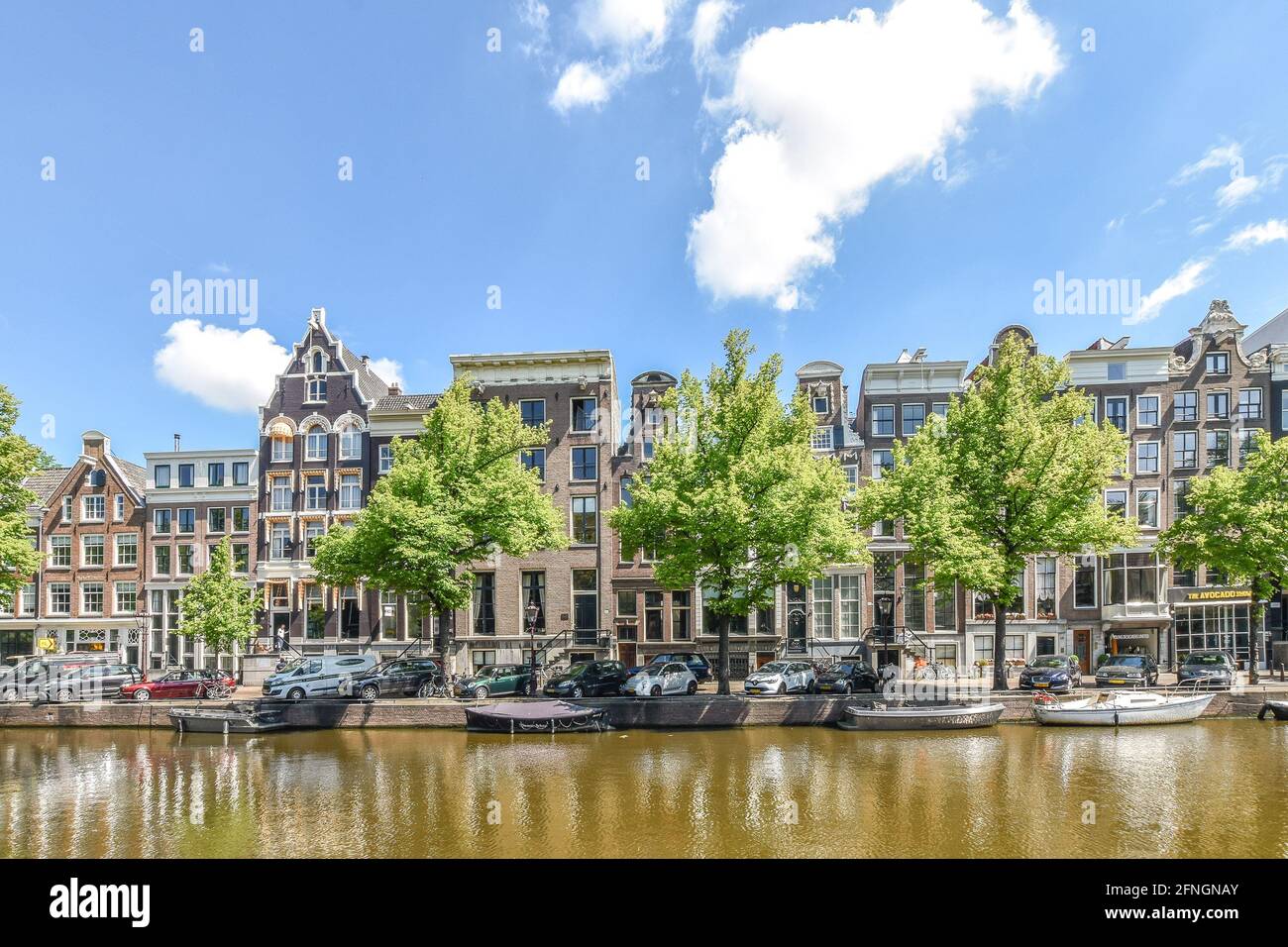 Row of traditional Dutch medieval houses on canal Stock Photo - Alamy
