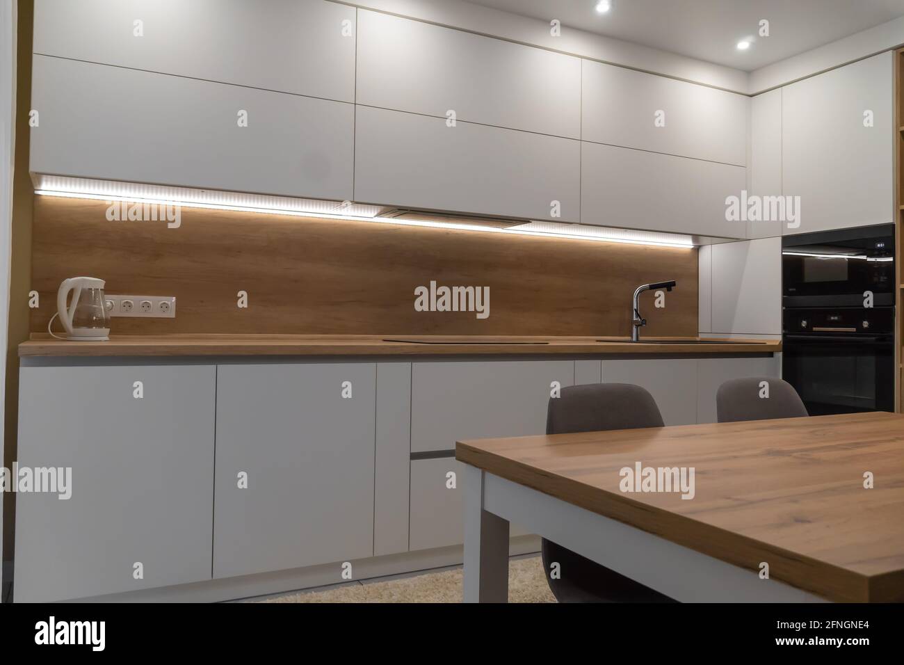 Beautiful modern minimalistic interior of a bright kitchen with ...