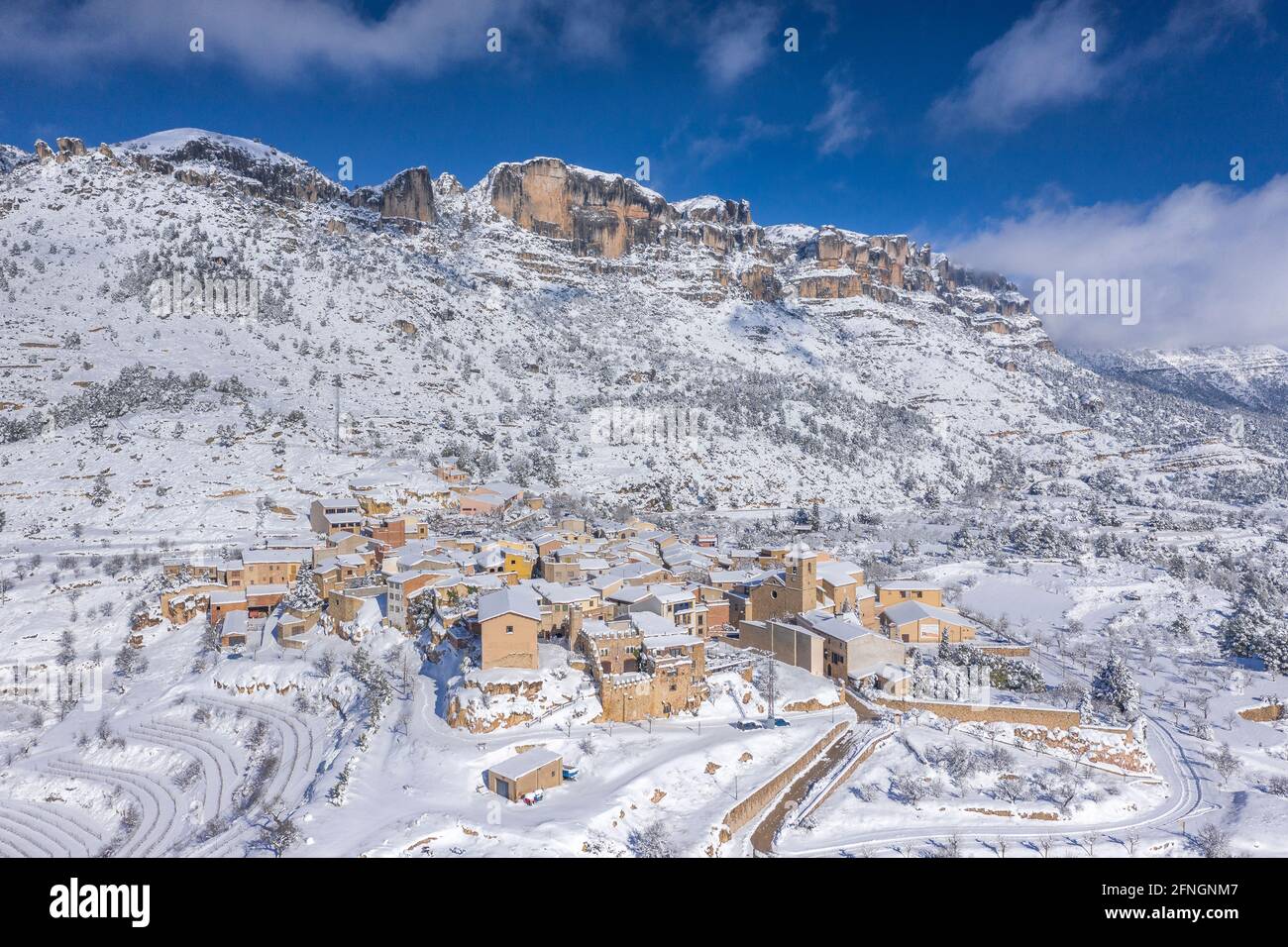 Montsant and La Morera de Montsant village aerial view, snowy in winter ...