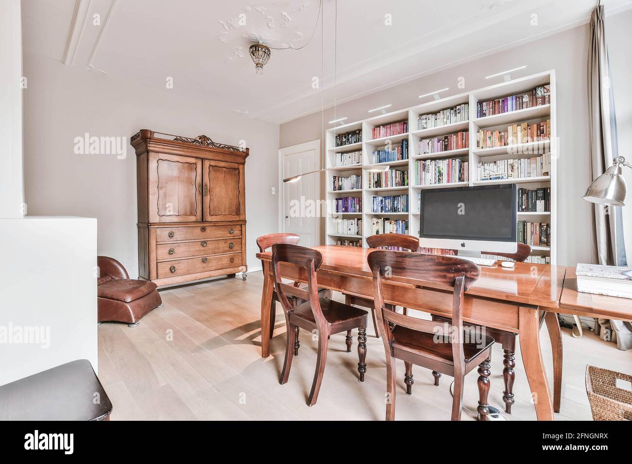Study room with antique furniture and books Stock Photo - Alamy
