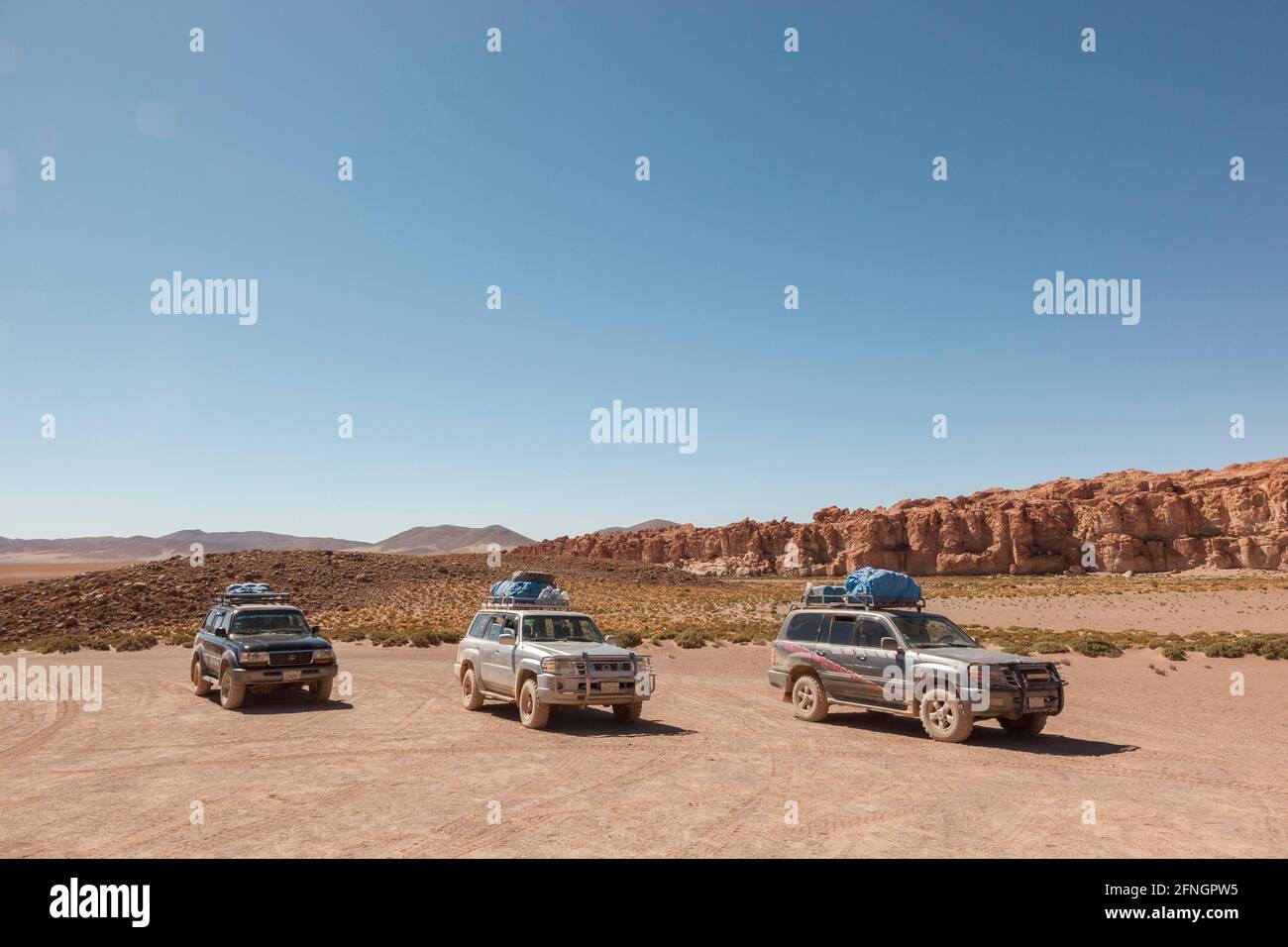 Three off-road vehicles in the Atacama Desert Stock Photo - Alamy