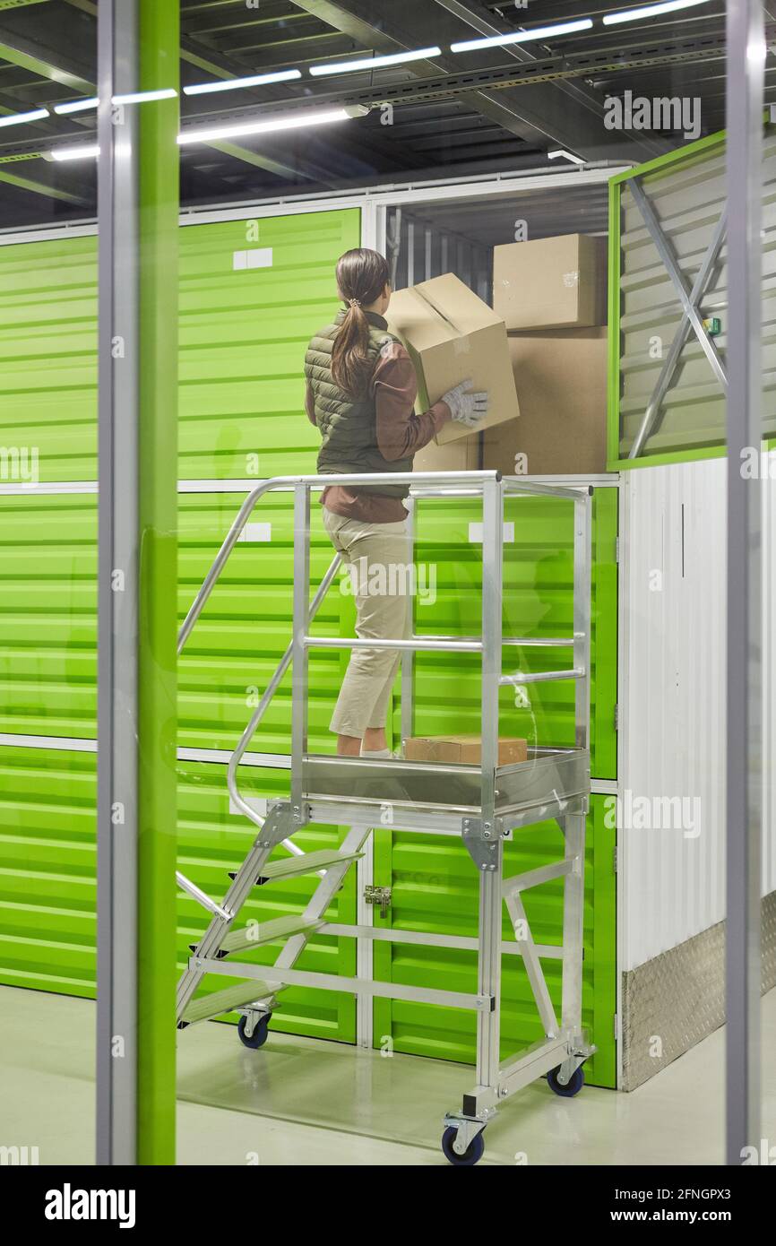 Female worker packing box in warehouse hi-res stock photography and ...