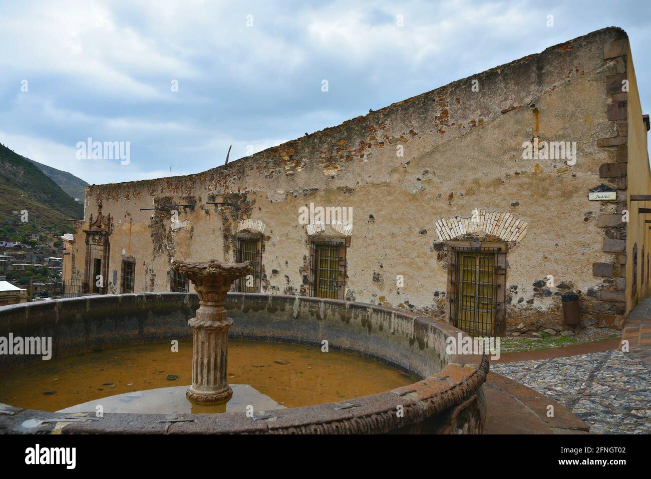 Scenic exterior view of the Centro Cultural and the old stone water ...
