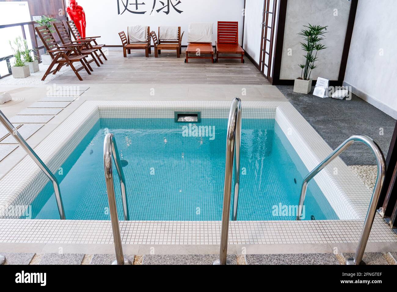 Indoor modern swimming pool in hotel spa center. Beautiful pool in a ...