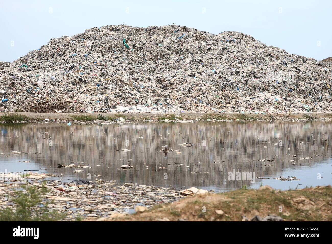 The waste is near natural water sources, resulting in water pollution ...