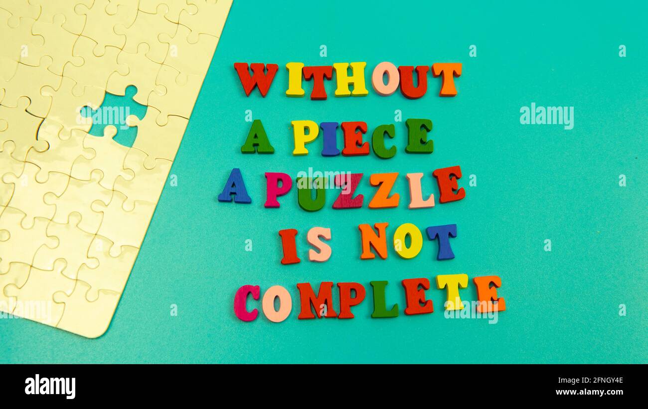 Selective focus of a motivational quote saying that without a piece a ...