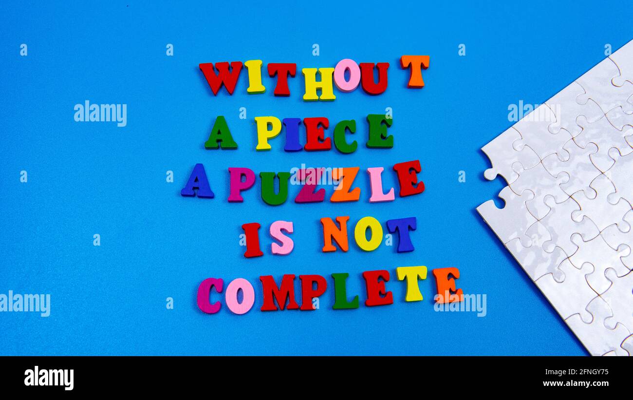 Selective focus of a motivational quote saying that without a piece a ...