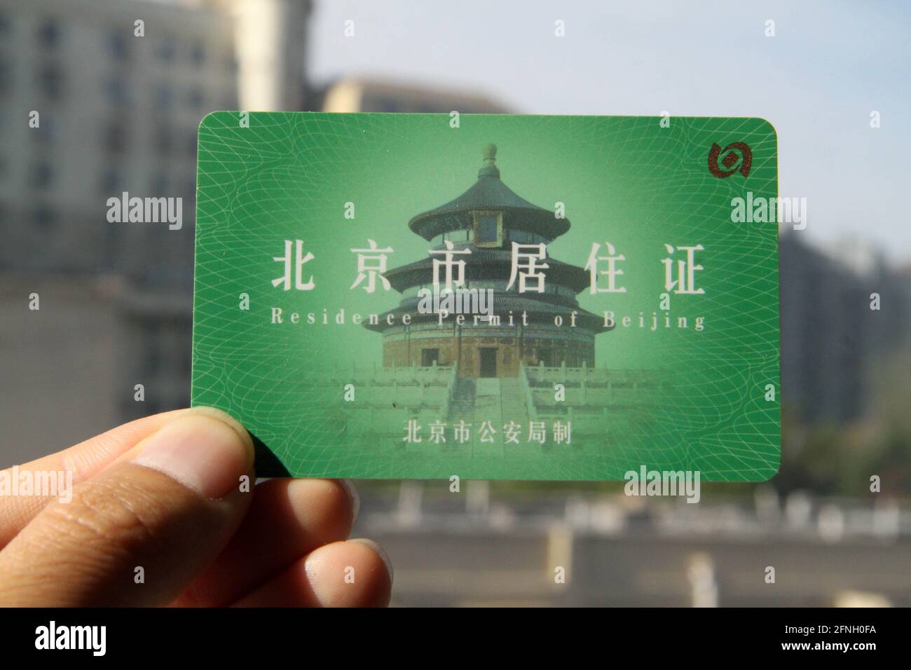 BEIJING, CHINA - MAY 17, 2021 - A resident shows his Beijing residence ...