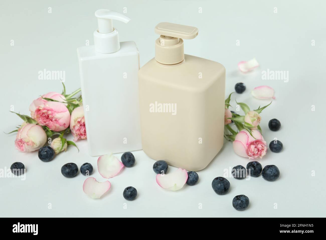 Natural shower gel and ingredients on white background Stock Photo - Alamy