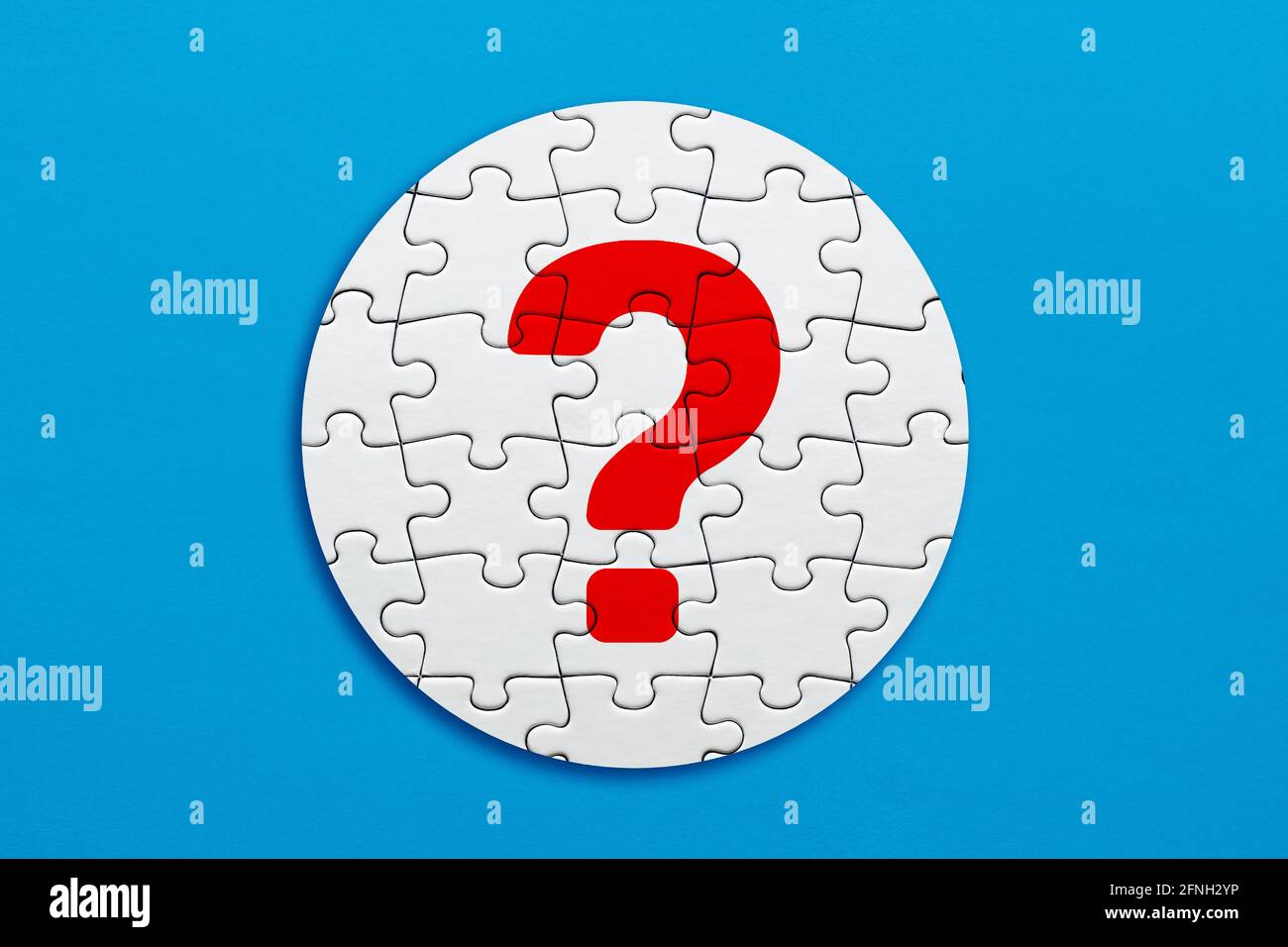 Question mark on a circle made out of puzzle pieces. Problem, mystery ...