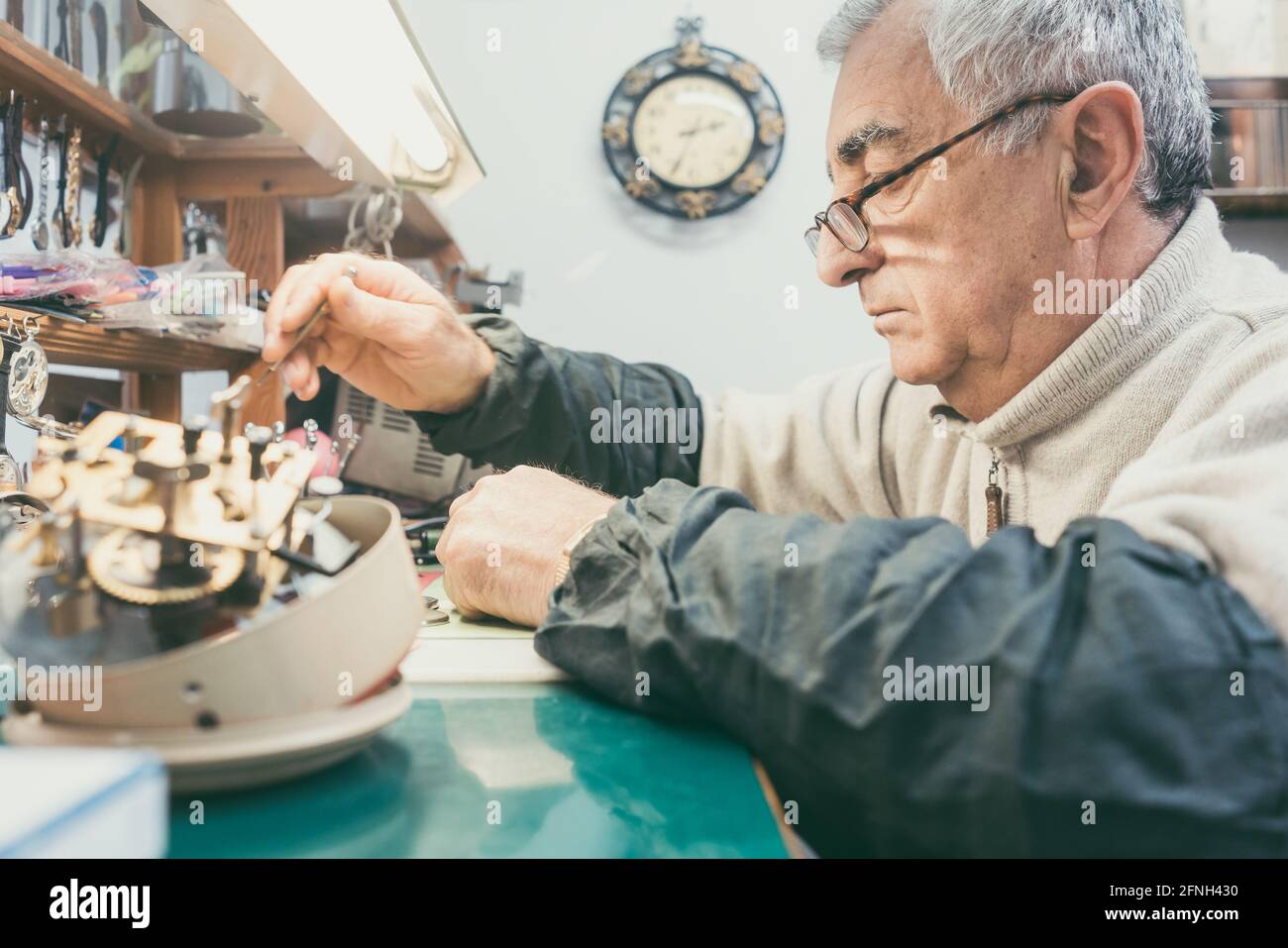 Broken clock repair hi-res stock photography and images - Alamy