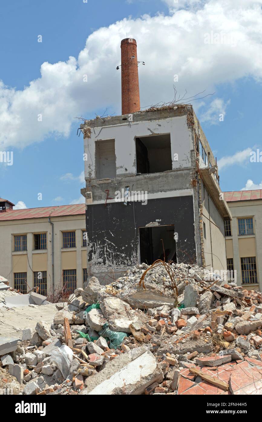 Abandoned Factory Building and Big Pile of Demolition Debris Stock ...