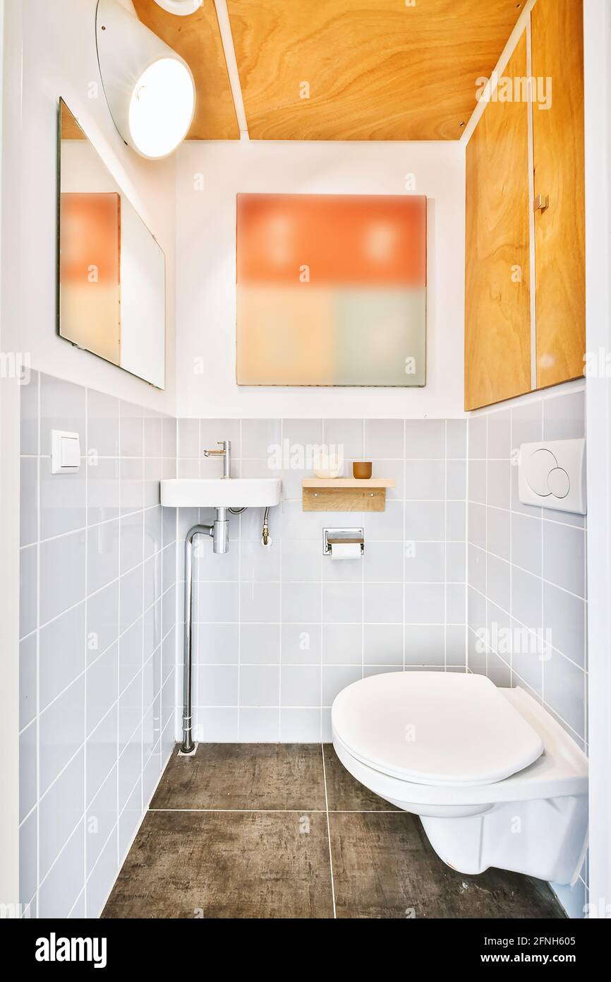Interior of small restroom at home Stock Photo - Alamy