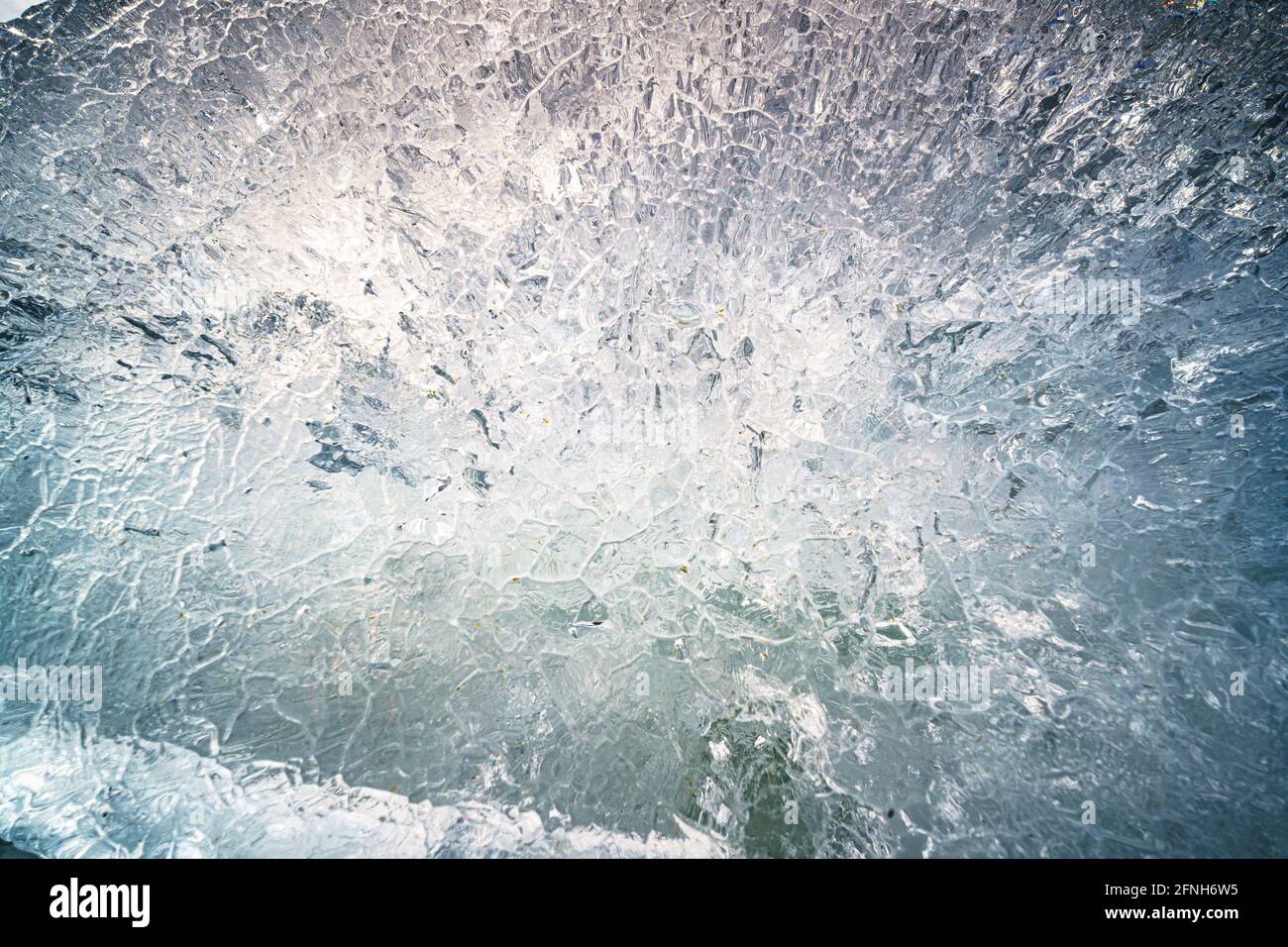 Texture of an ice floe floating on the water Stock Photo - Alamy