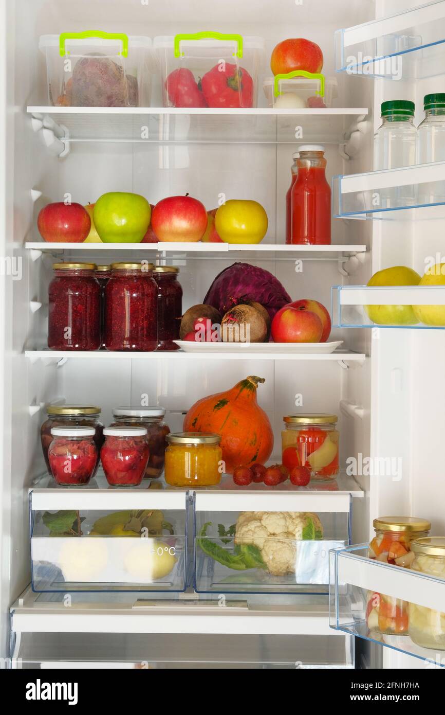 Variety glass jars homemade fruit and berry jams, juices and fresh ...