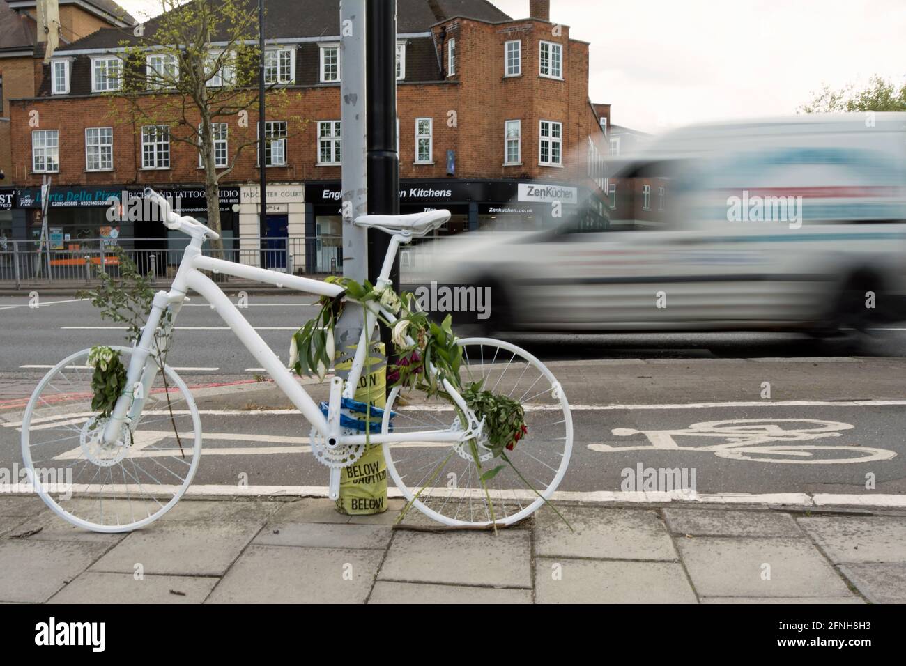 white painted ghost bike marking the spot where a cyclist was killed by ...