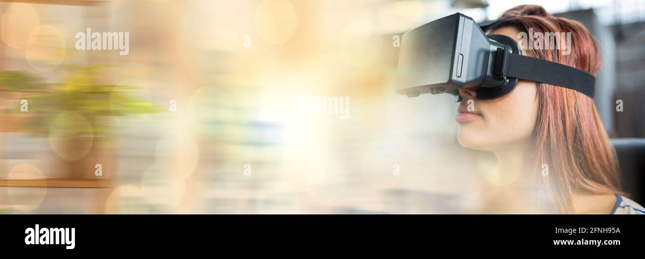 Gold sparkling transition over a woman using vr headset, virtual ...